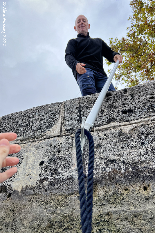 Paul on lock rope duty – Wheeling It: Tales From a Nomadic Life